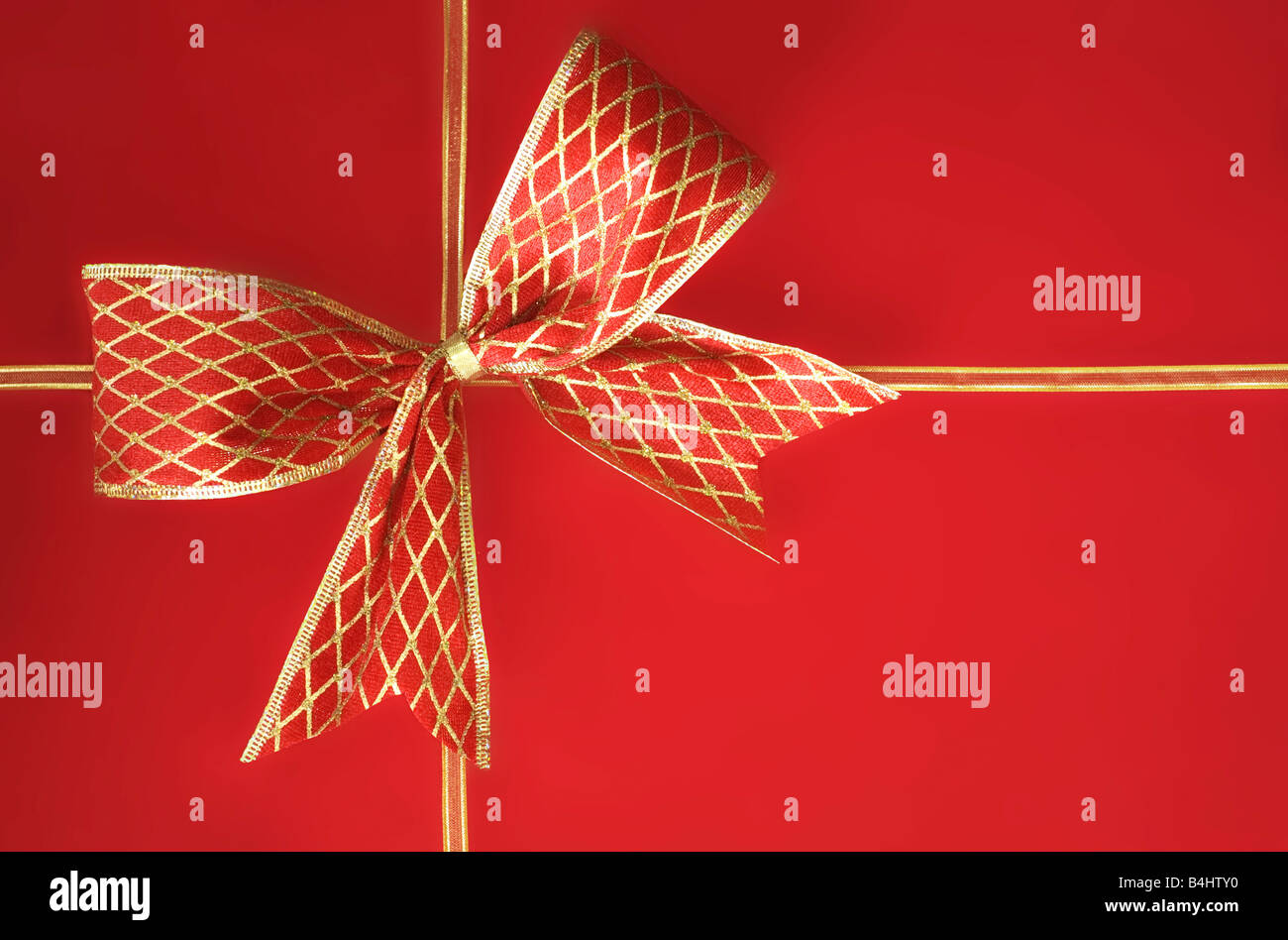 Red and golden bow hi-res stock photography and images - Alamy