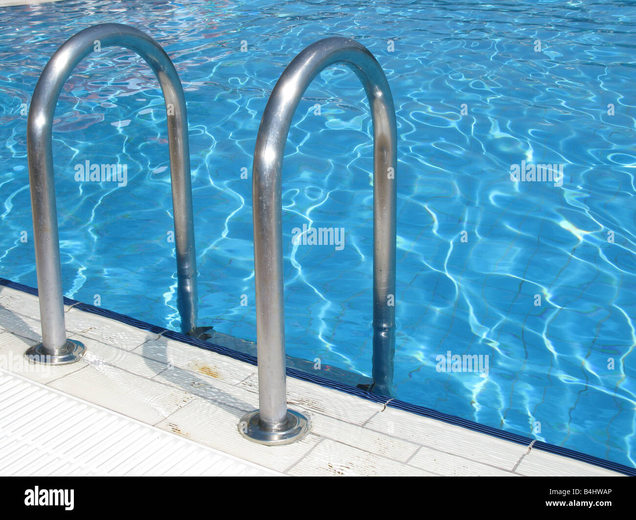 Swimming pool steps Stock Photo - Alamy