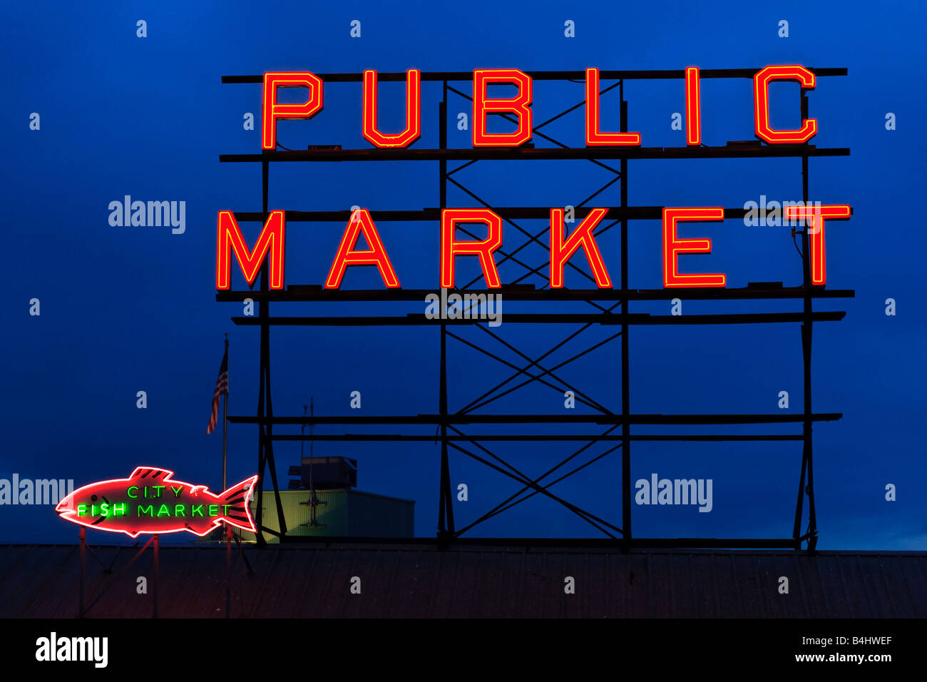 The neon Public Market sign at the Pike Place Market in Seattle glows ...