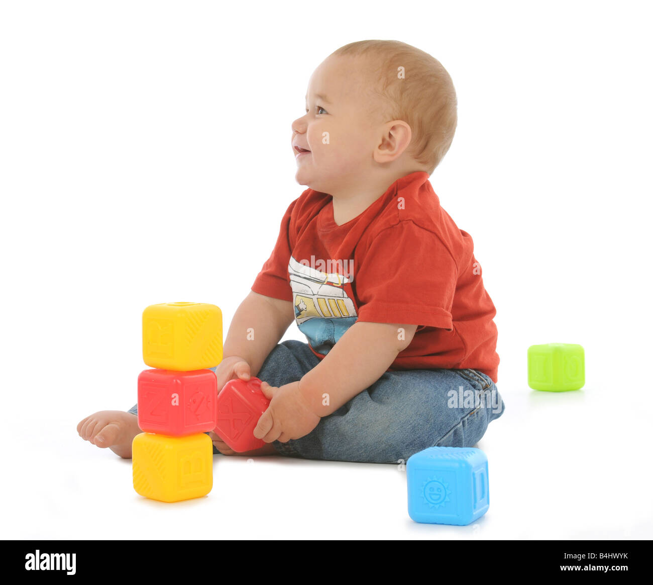 A young baby learning to walk and crawl, babies development in the ...