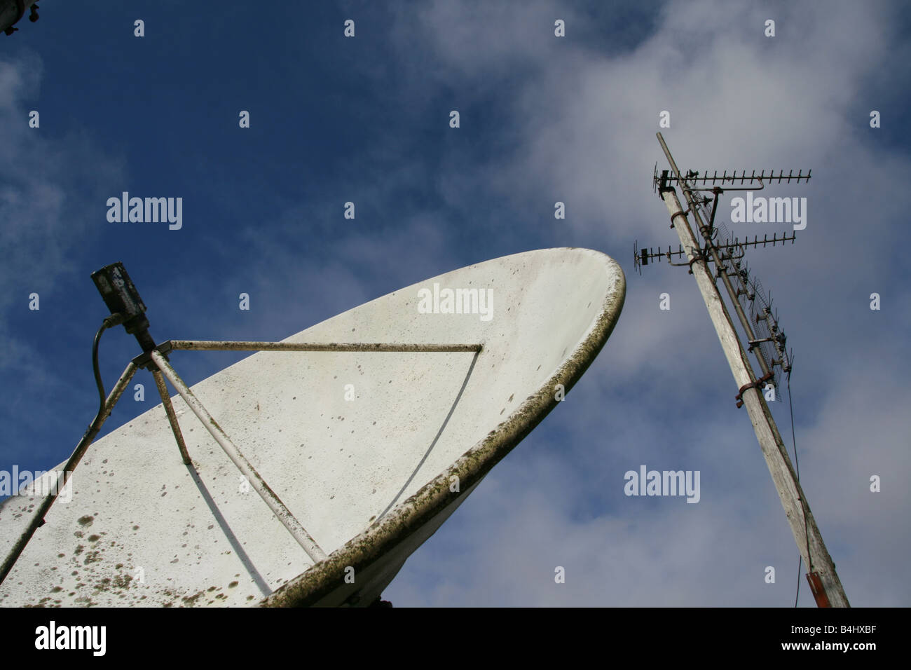 radio transmitter dish and antennas with blue sky Stock Photo - Alamy