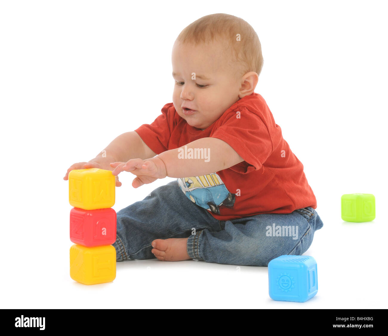 A young baby learning to walk and crawl, babies development in the ...