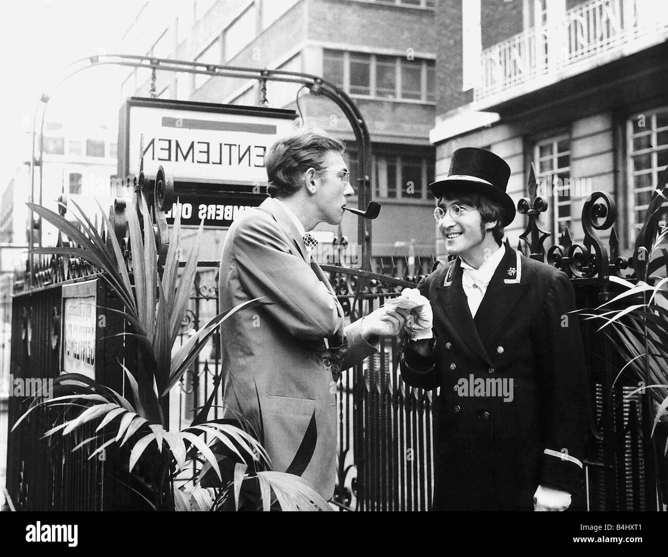 Peter Cookactor comedian with John Lennon Stock Photo - Alamy