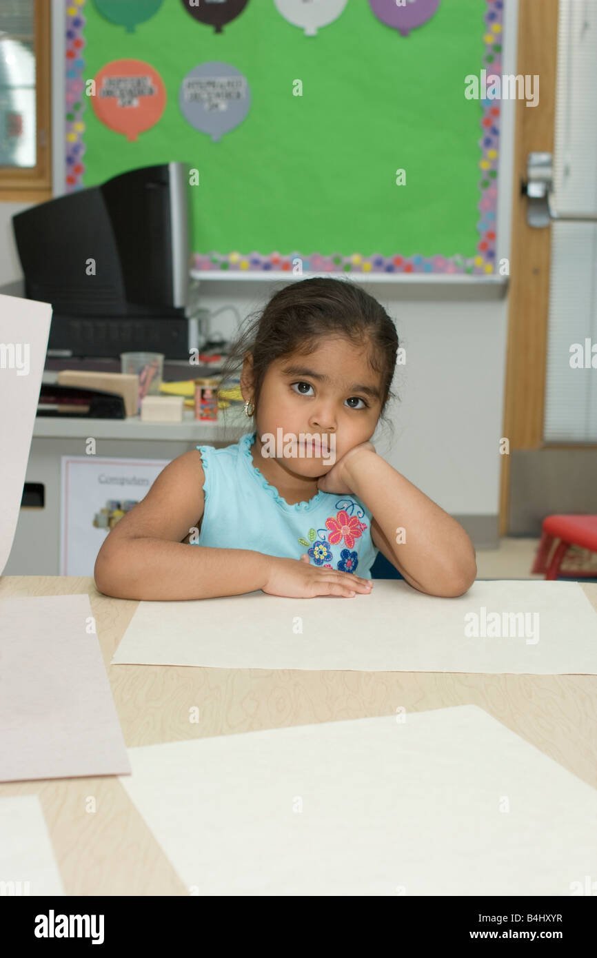 Preschool girl looking into the camera Stock Photo - Alamy
