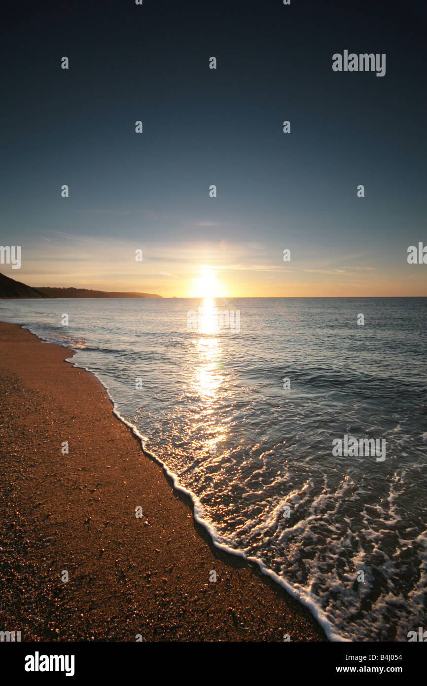 sunrise on the beach Stock Photo - Alamy