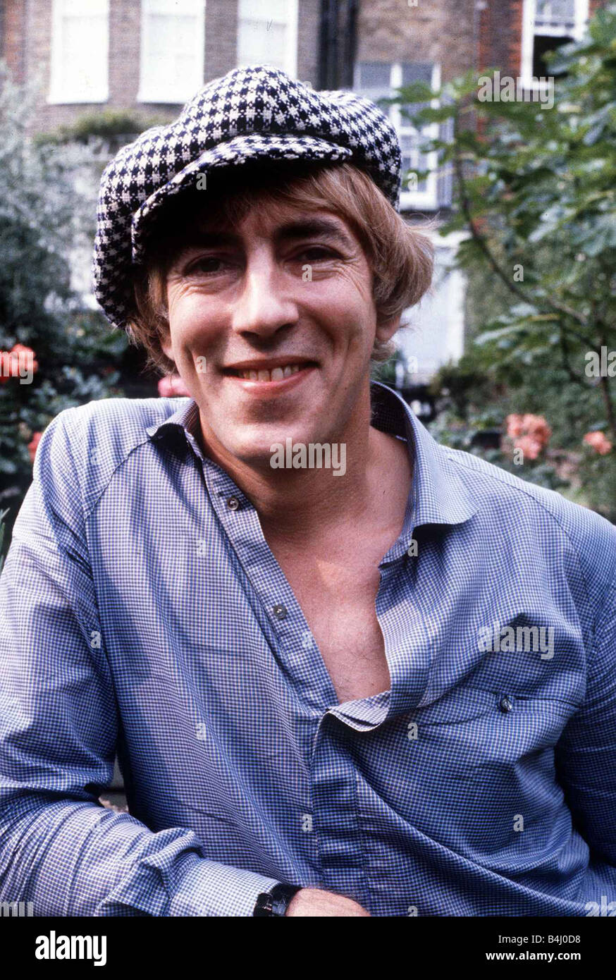 Peter Cook actor at home in his garden wearing a hat Stock Photo - Alamy