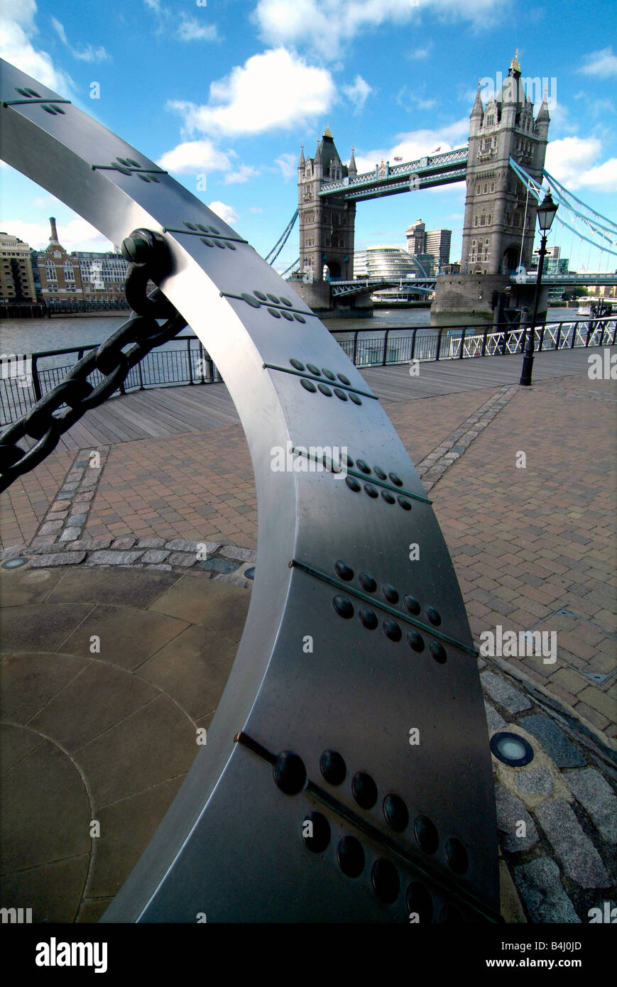 Tower Bridge spanning river Thames with sundial in foreground London ...