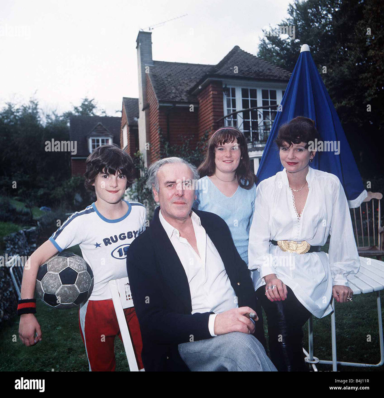 Actor George Cole at home with family October 1980 Stock Photo - Alamy
