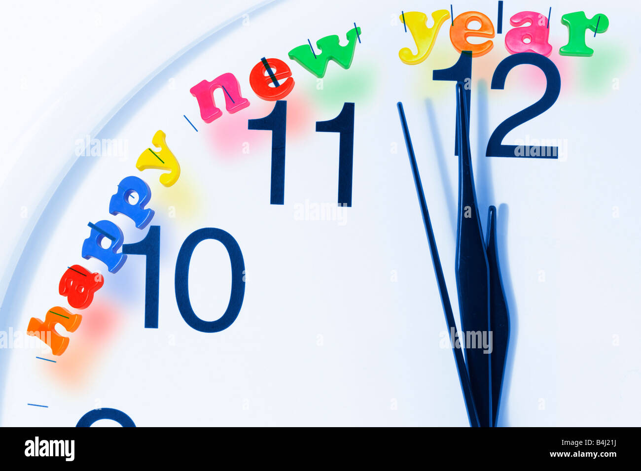 Clock Face with Happy New Year Stock Photo - Alamy