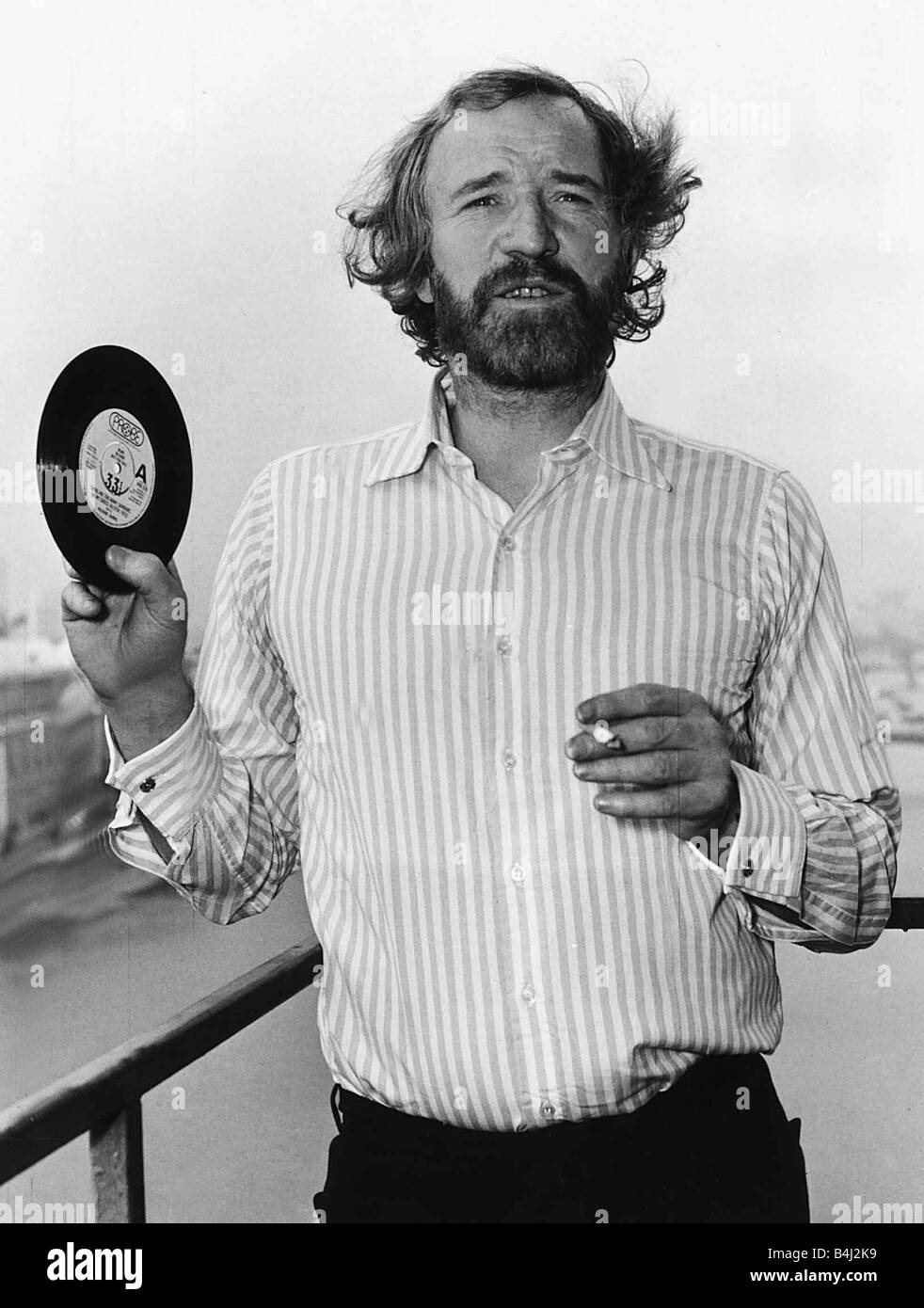 Richard Harris Irish actor holding copy of pop single 1972 Stock Photo ...