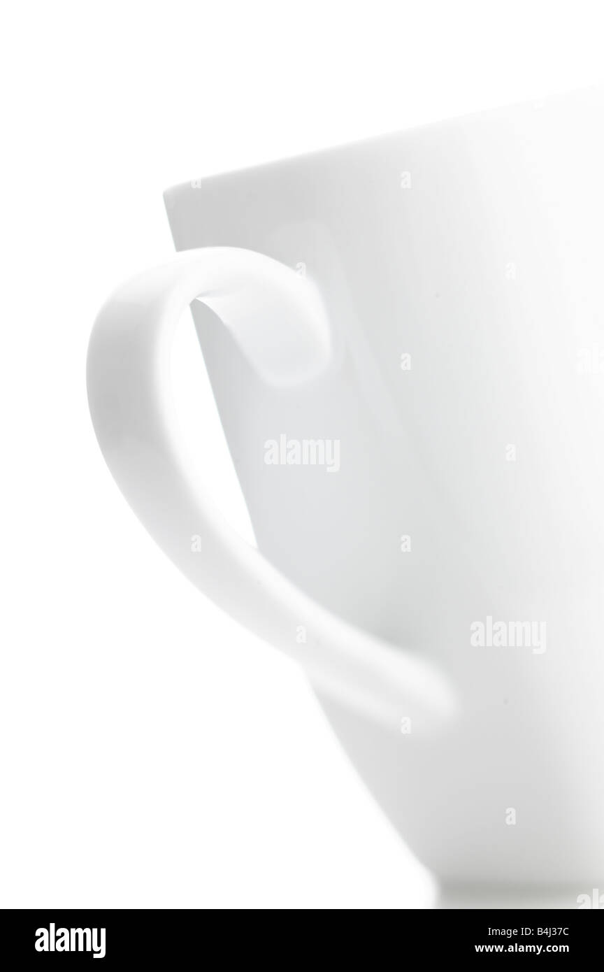 Angled mug on white background Stock Photo - Alamy