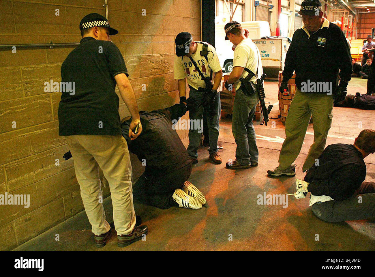 Armed Policemen And Robbery Suspects At The Scene Of An Attempted 30