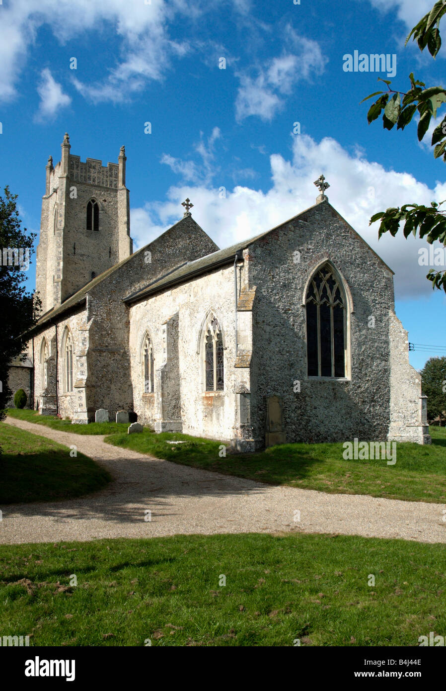 square towered flint built church at Honingham Norfolk England Stock ...