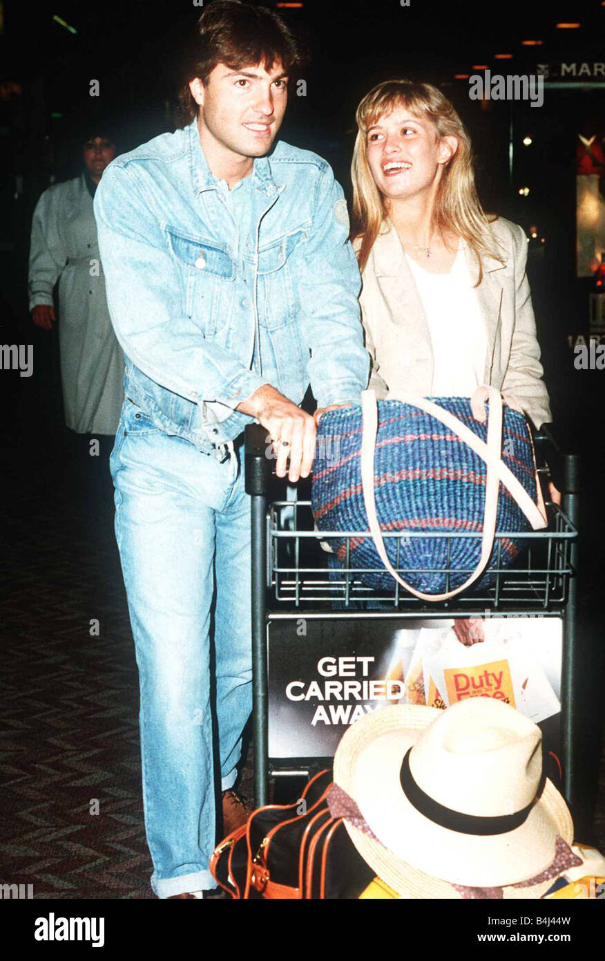 Actor Nick Berry arrives at Heathrow Airport with model Rachel Roberts ...