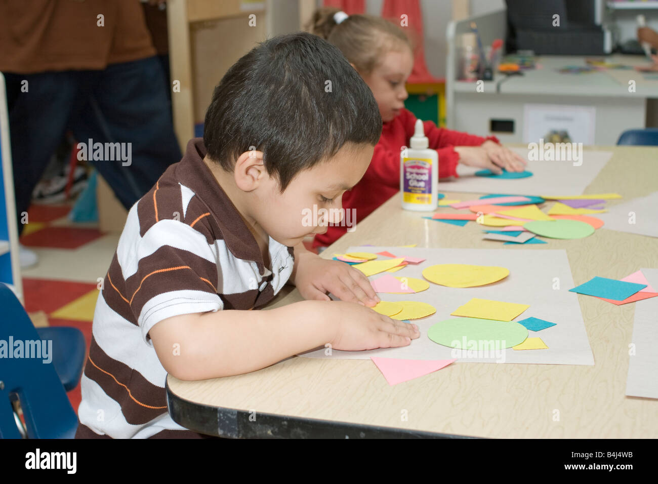 Preschool boy working on a art project Stock Photo - Alamy