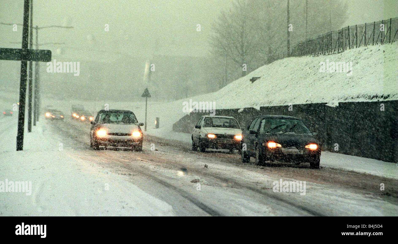 The first snow of the winter January 1998 in Glasgow Traffic cars in ...