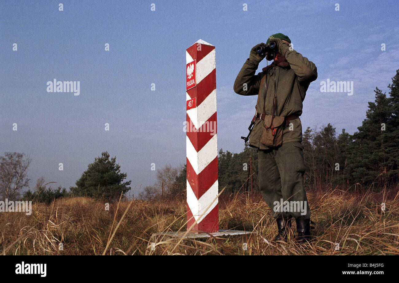 Polish border guard officer monitoring the situation at the Polish ...