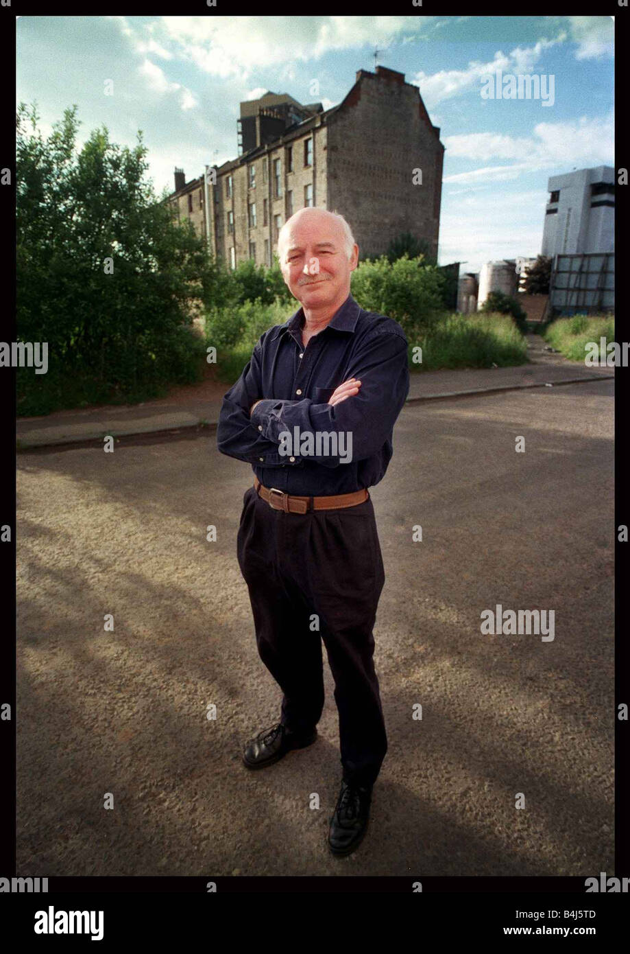 Dave Anderson actor June 1998 standing in the middle of road arms ...
