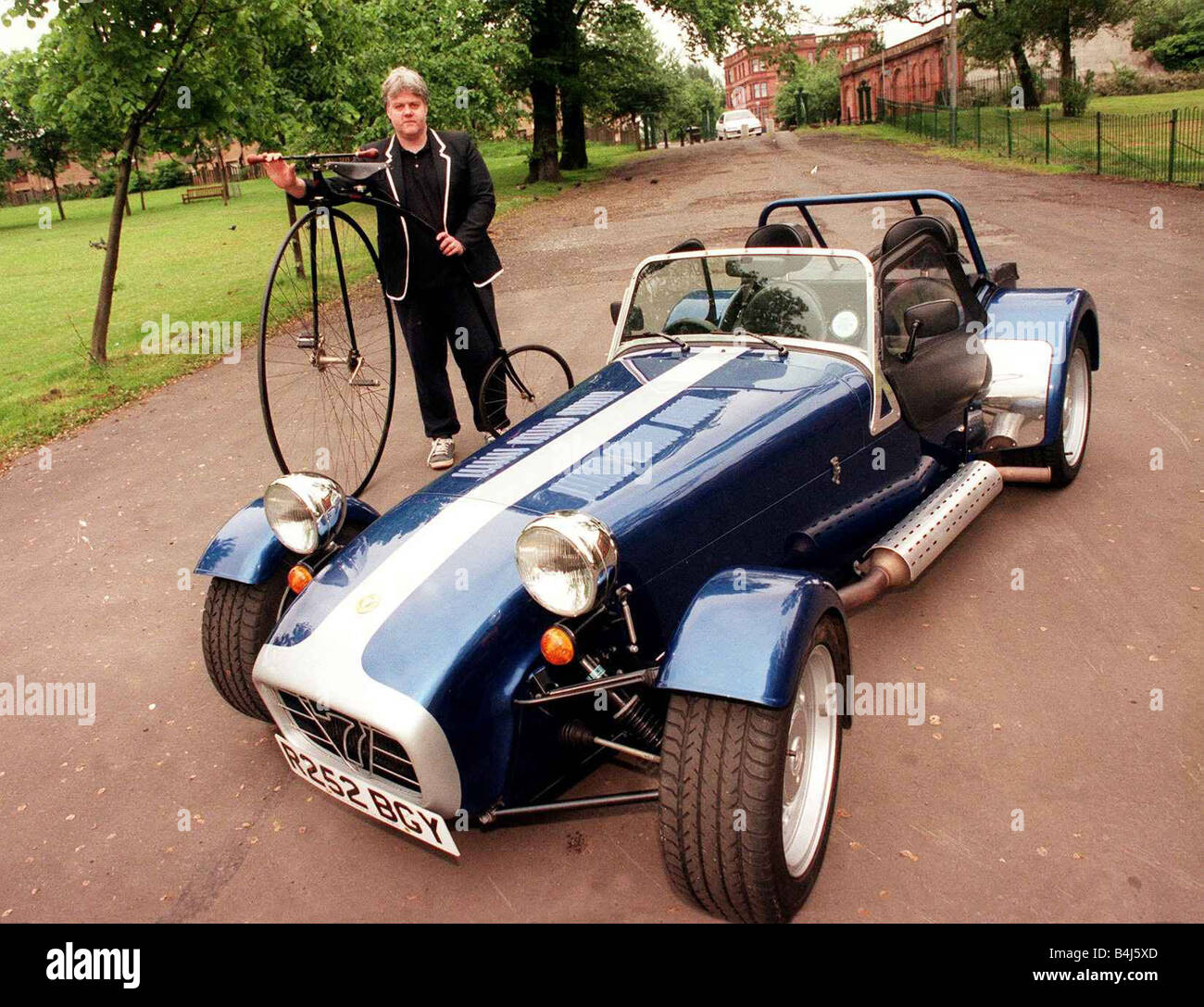Caterham sports car July 1998 John Moran holding a Penny Farthing ...