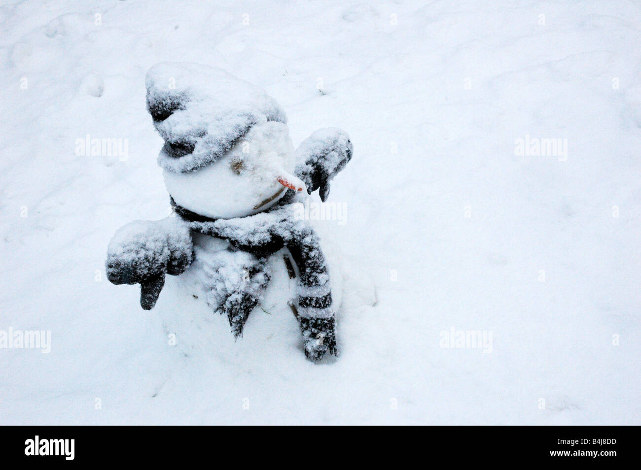 Funny melting snowman hi-res stock photography and images - Alamy