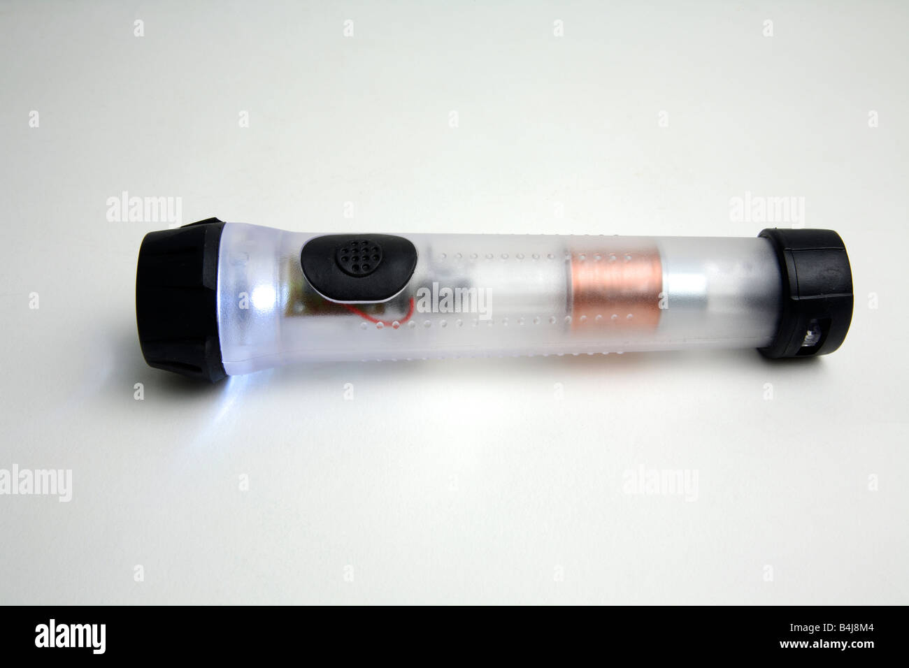 A hand powered rechargeable torch Stock Photo - Alamy