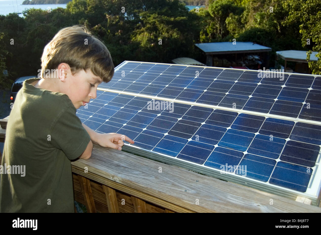 Boy examining solar cells Stock Photo - Alamy