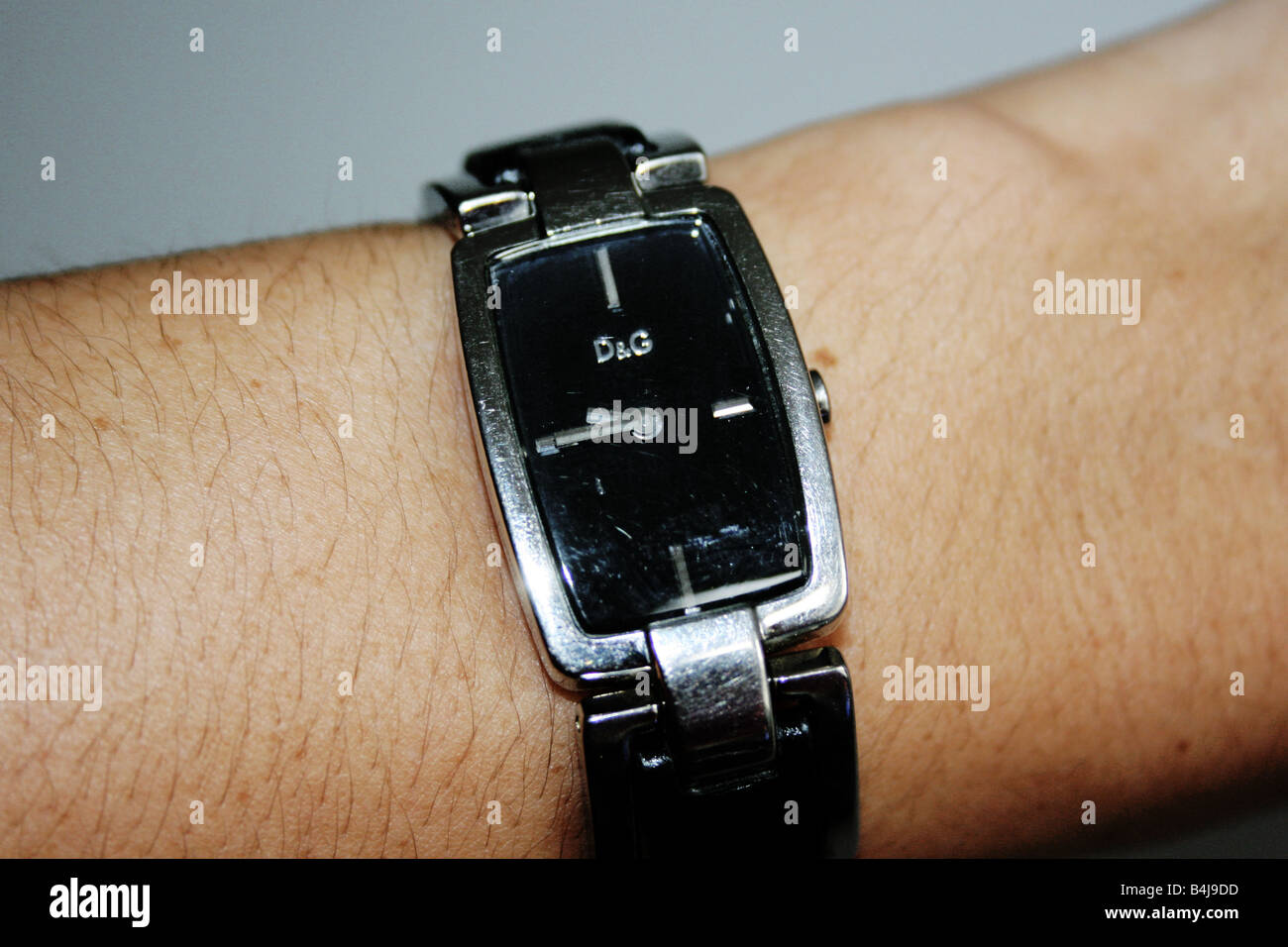 A black wrist watch Stock Photo - Alamy