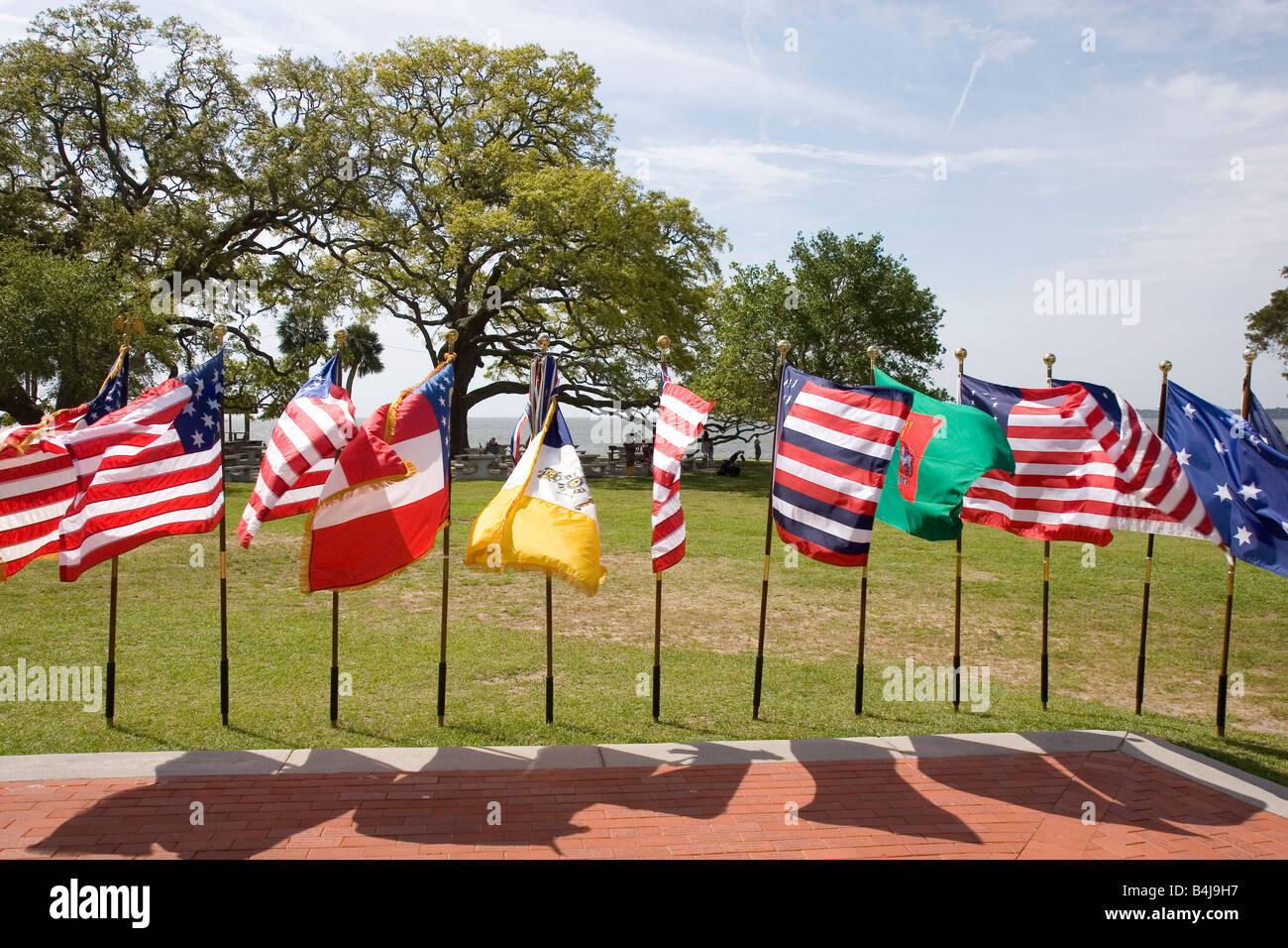 A display of historic american flags at a park Stock Photo - Alamy