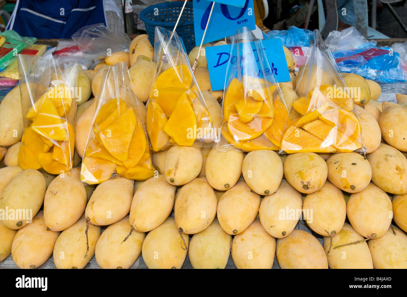 Ripe fresh mangoes on a street stall in Bangkok Thailand Stock Photo ...
