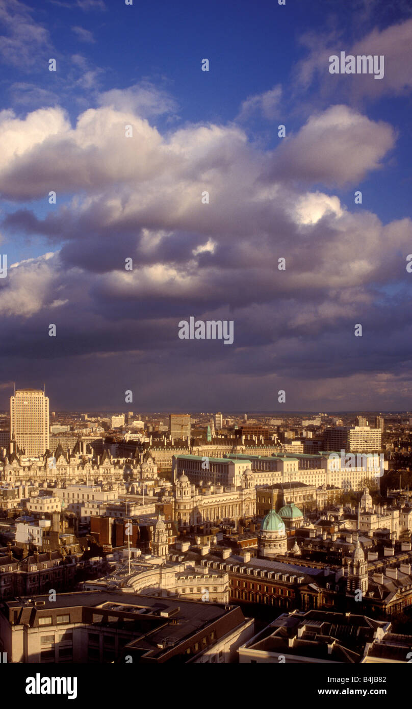 Dense cumulus clouds over central to east London,views over rooftops in ...