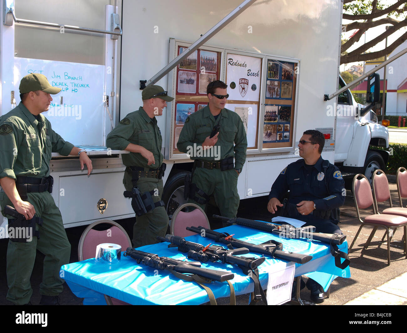 Members of the Redondo Beach police dept swat team chat during safety ...