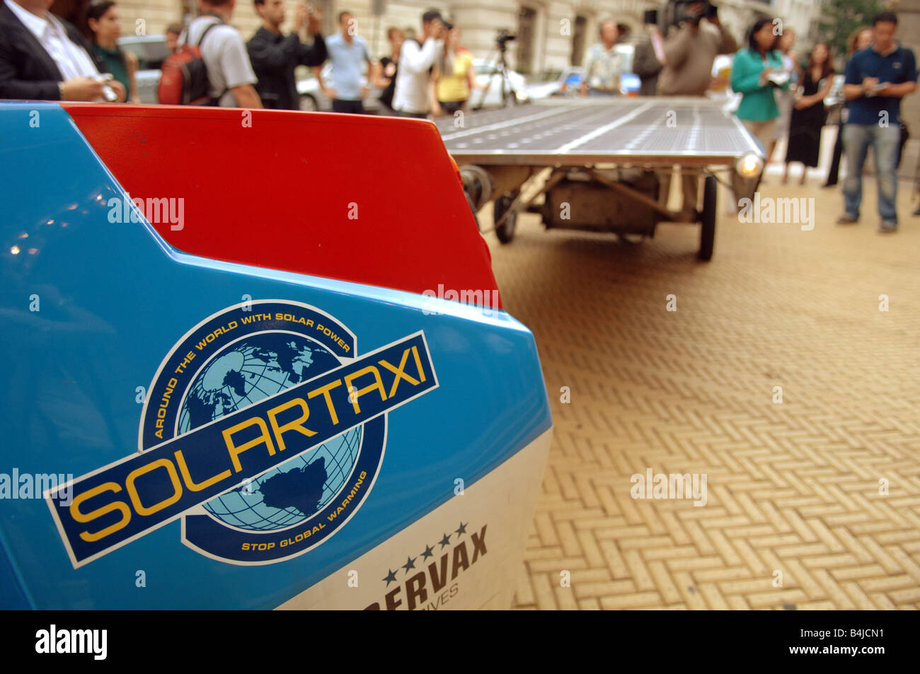 The Swiss Solar Taxi driven by Louis Palmer arrives at The Cooper ...