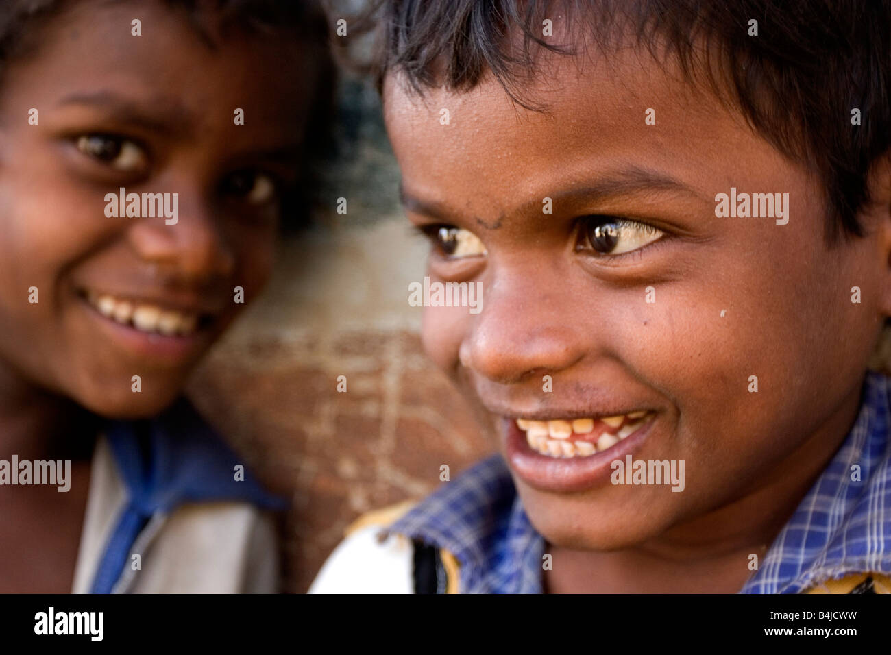 Two tribal boys in a happy moment at a tribal village of West bengal ...