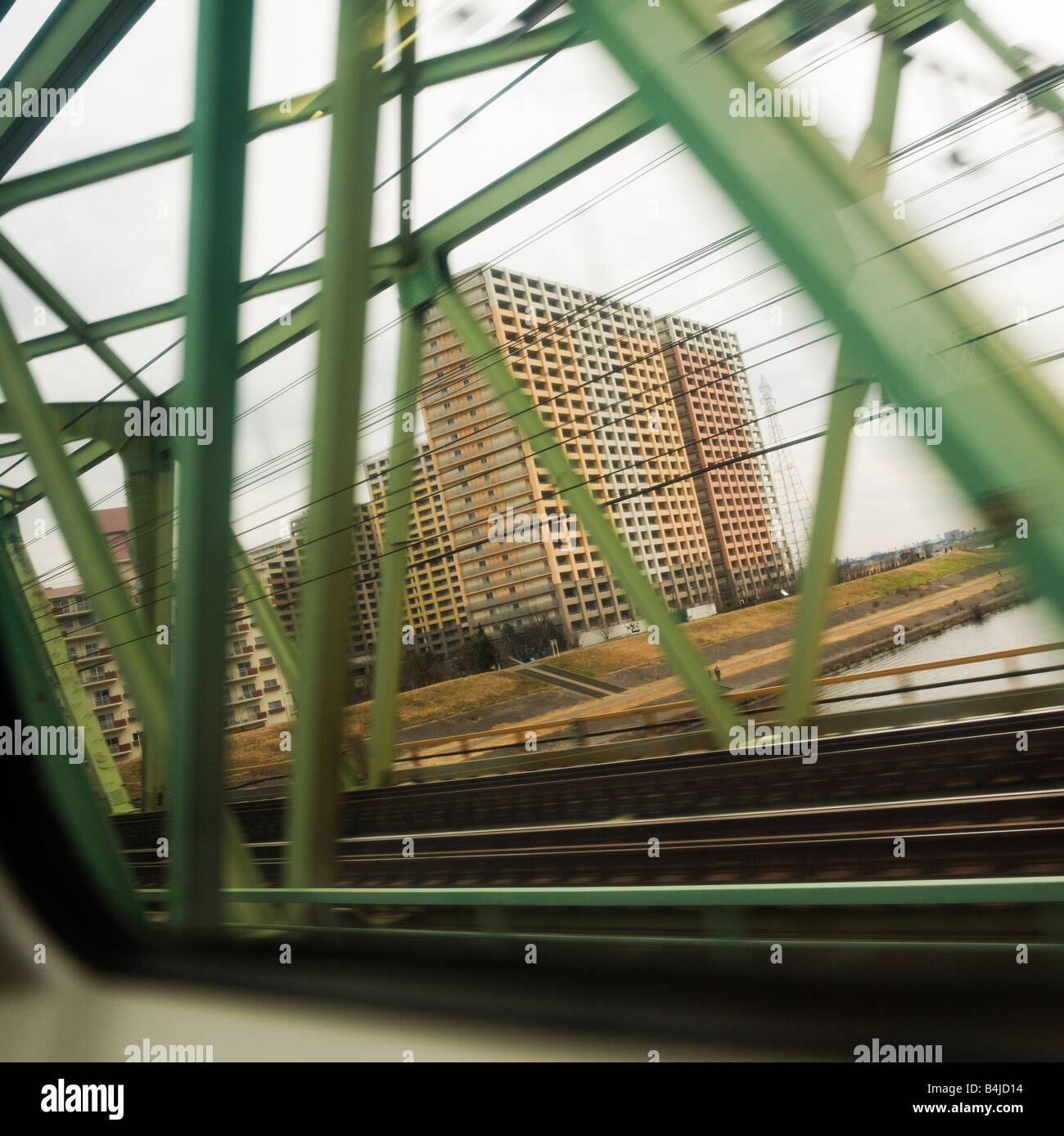 japan yokohama train window steel bridge speeding over Stock Photo - Alamy