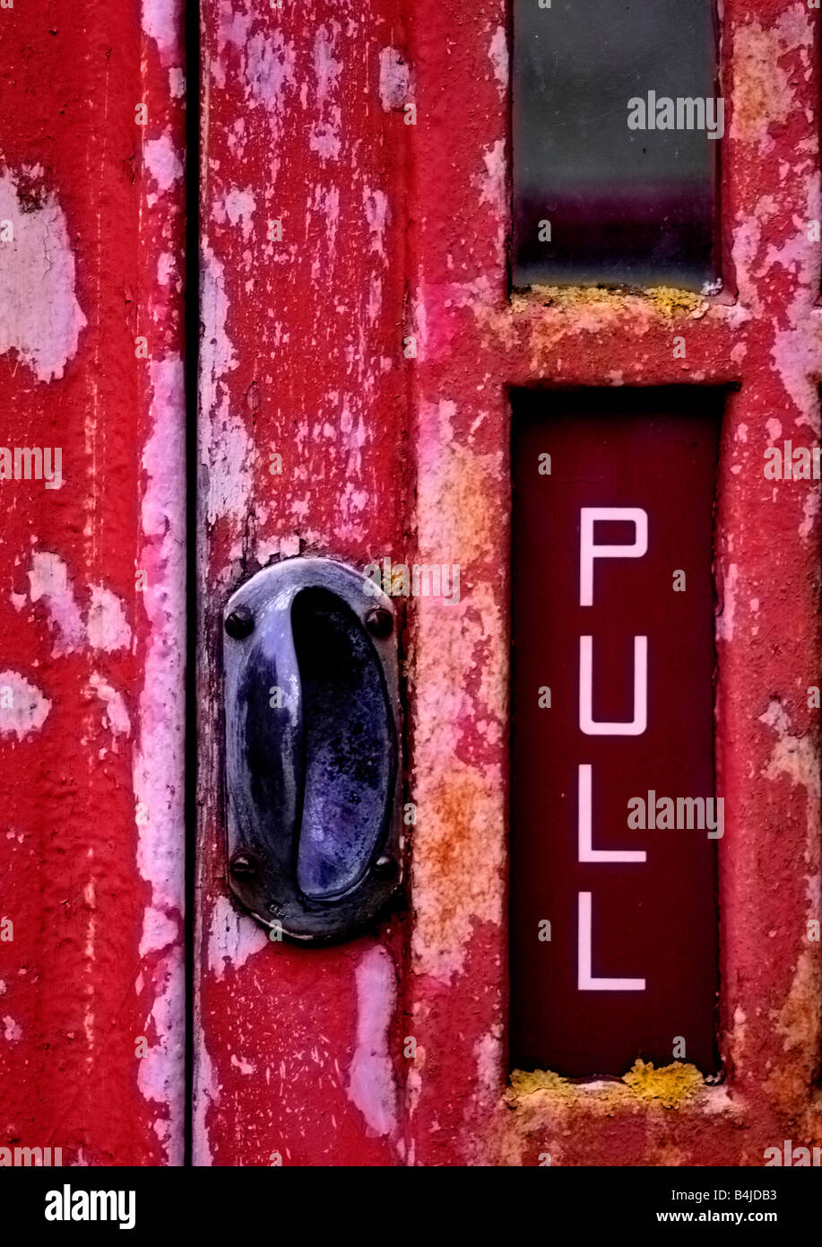 traditional British red public phone box with flaking paint Stock Photo ...