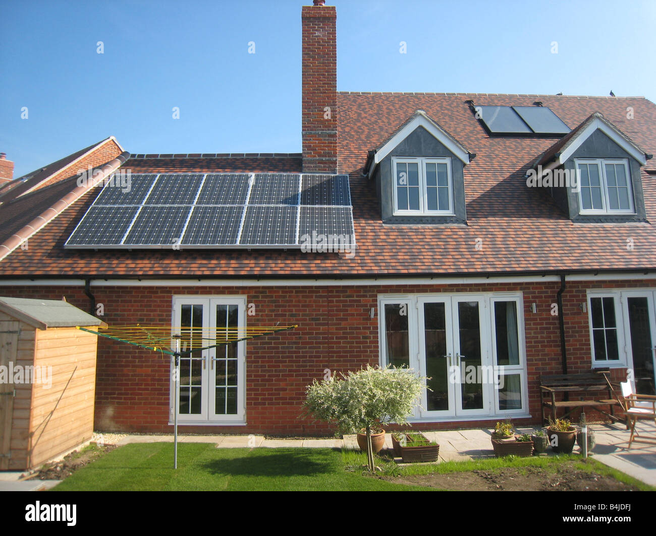 Installation of a photovoltaic solar power system on private house near ...