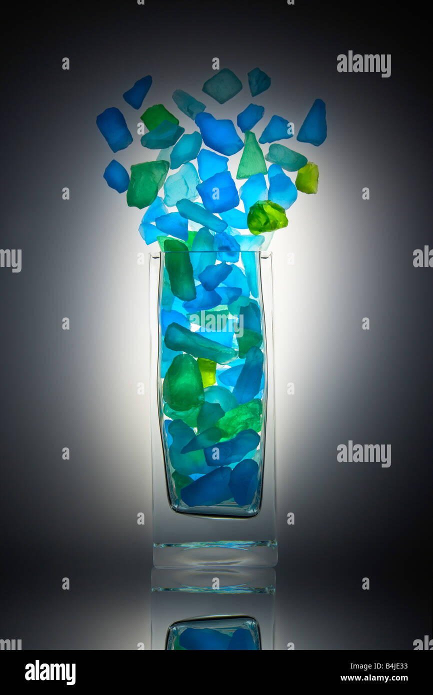 Still life image of blue-green colored translucent stones filling and ...