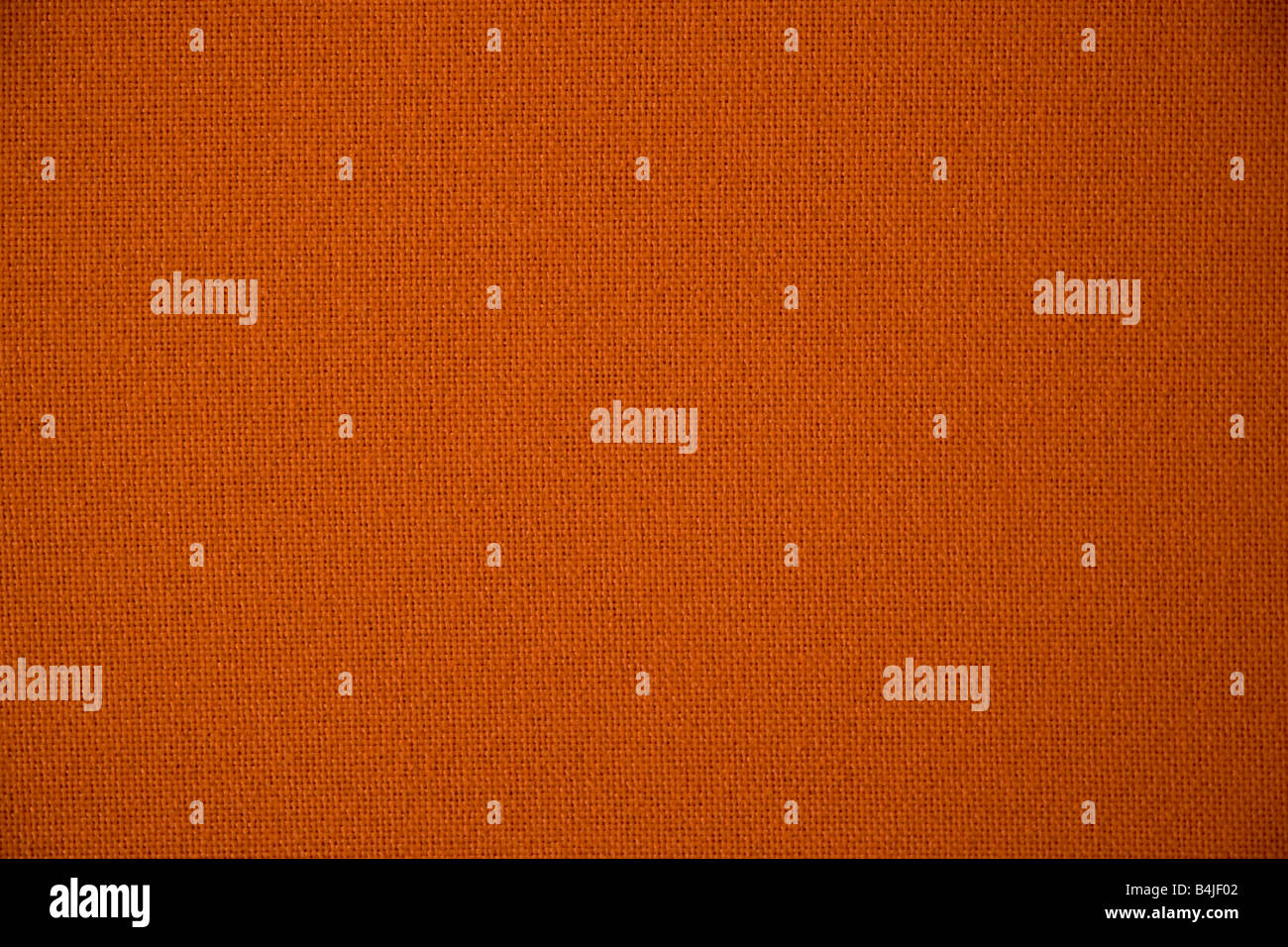 A orange fabric backdrop or texture Stock Photo - Alamy