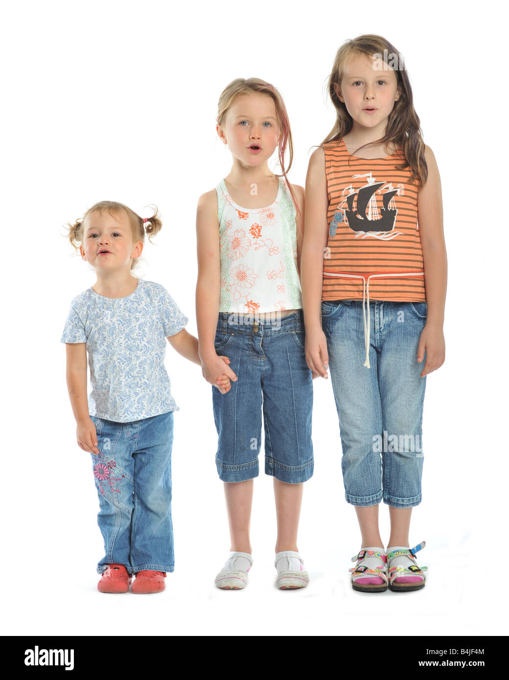 Three singing sisters Stock Photo - Alamy