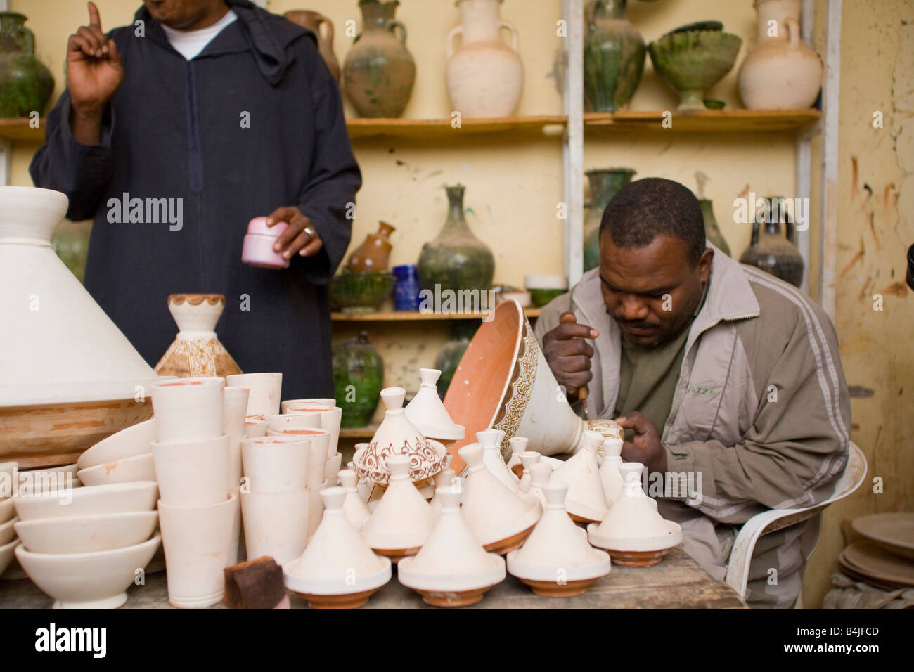 Men decorating pottery near Fez Morocco Africa. Horizontal.89975 ...