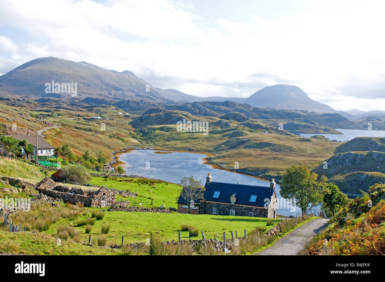 Loch Inchard Sutherland with Foinavon mountain rising beyond Scottish ...