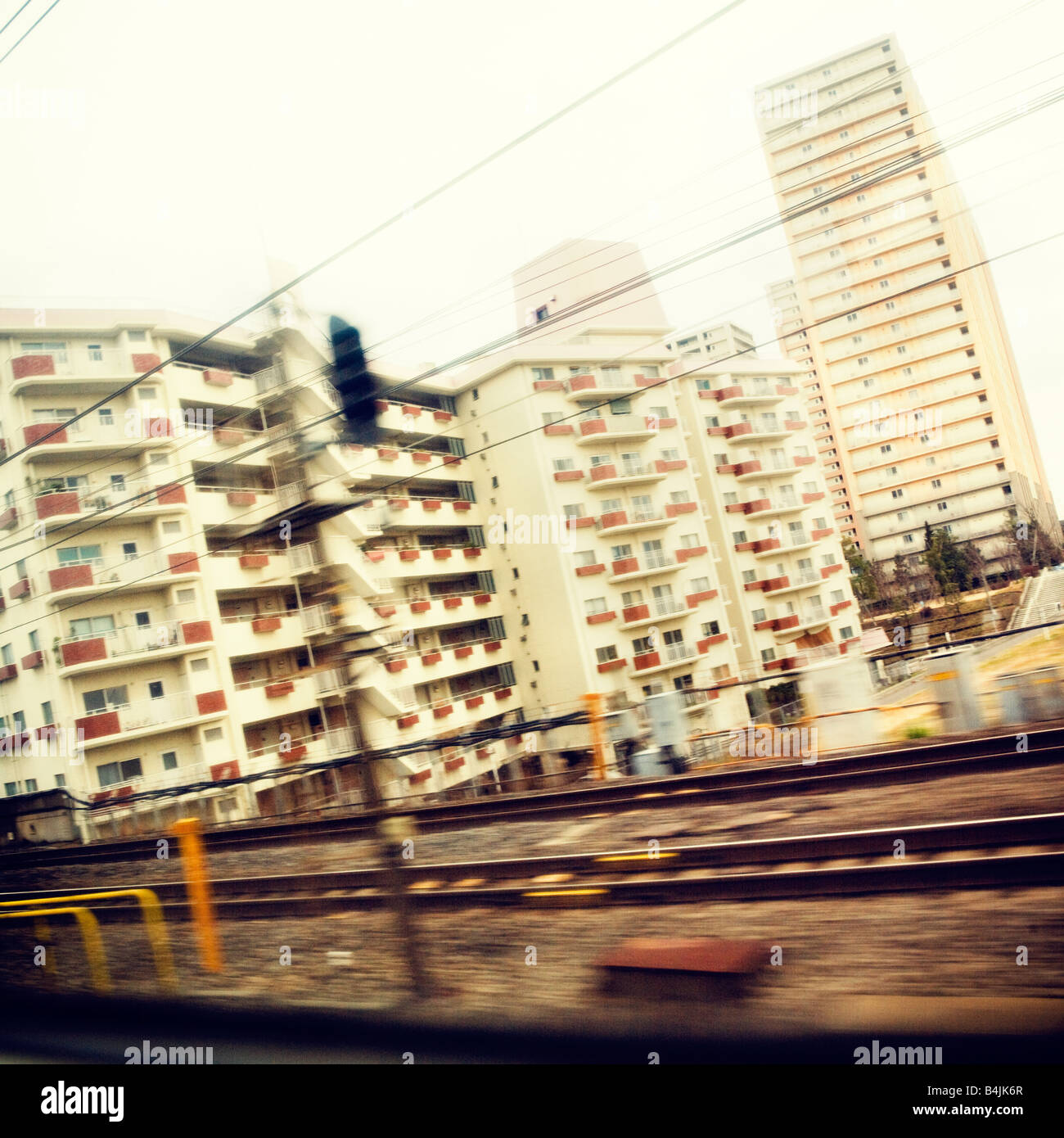 japan yokohama train window apartment blocks tokyo suburbs speed fast ...