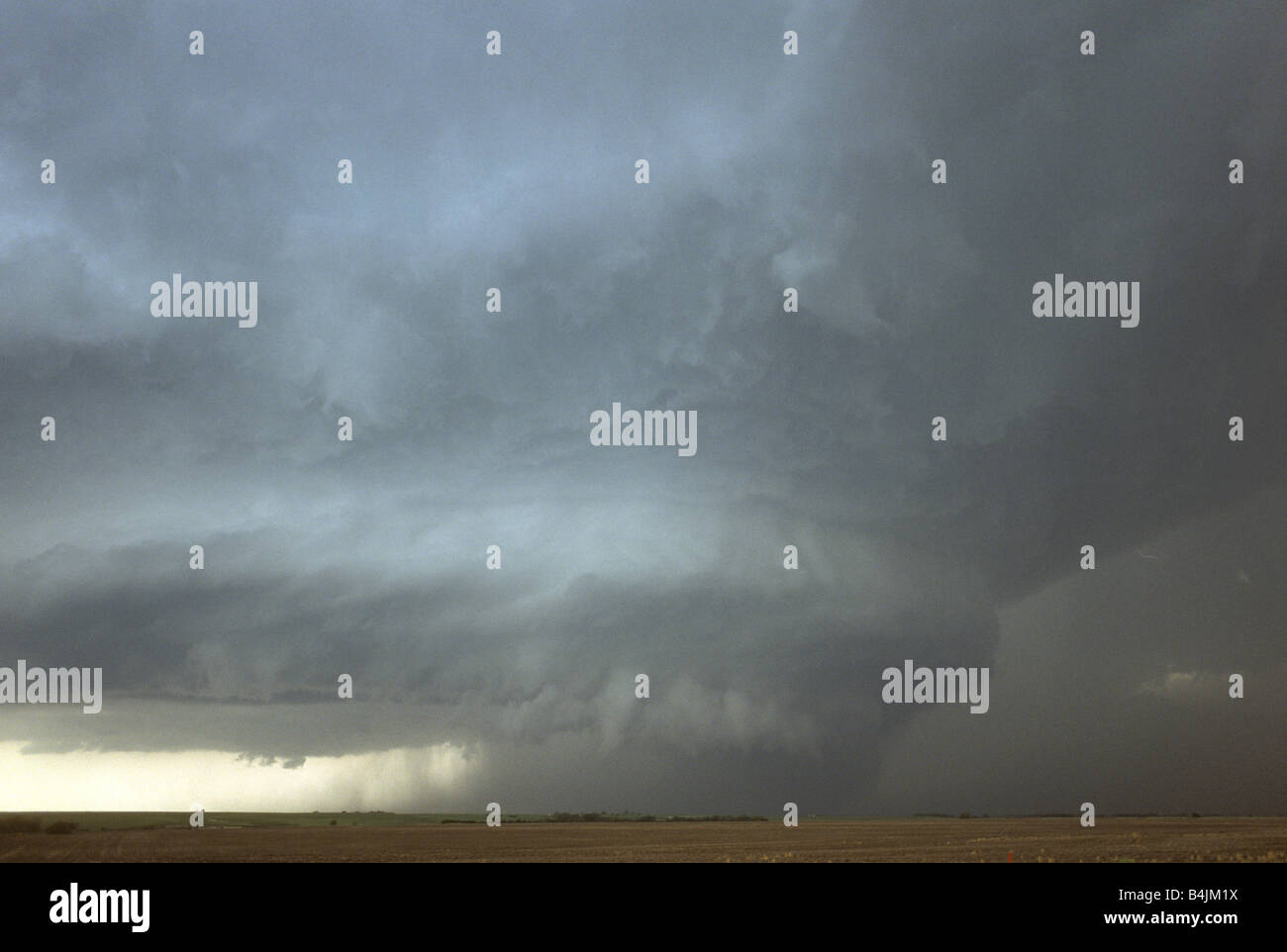 Severe thunderstorm over northern Kansas as a tornado develops under ...