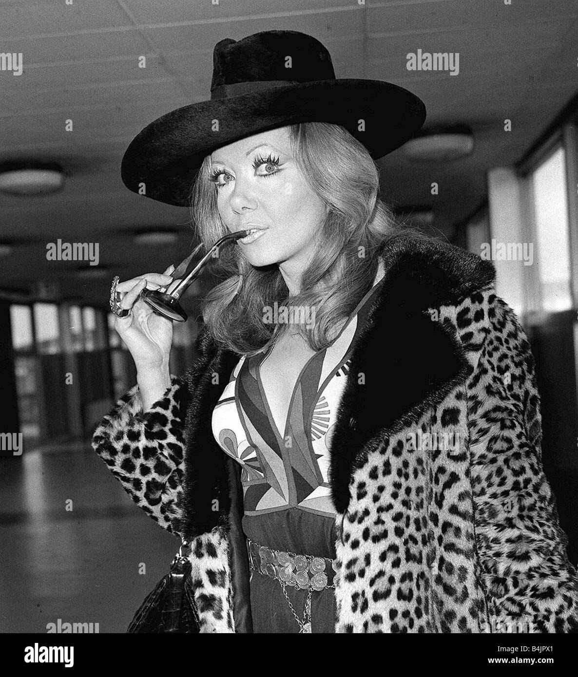 Ingrid Pitt arriving at Heathrow airport from Rome where she has had ...