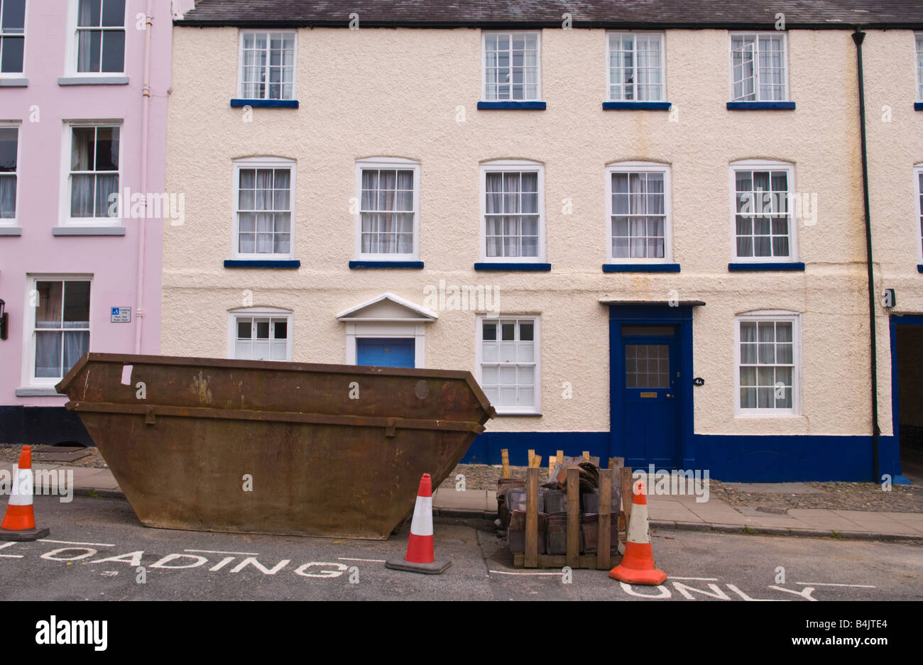 Skip outside house being renovated in Ludlow Shropshire England UK ...
