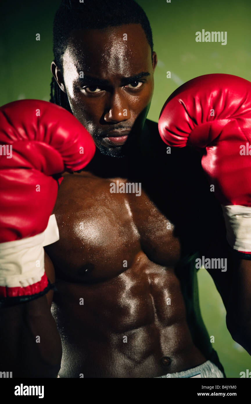 African male boxer wearing gloves Stock Photo - Alamy