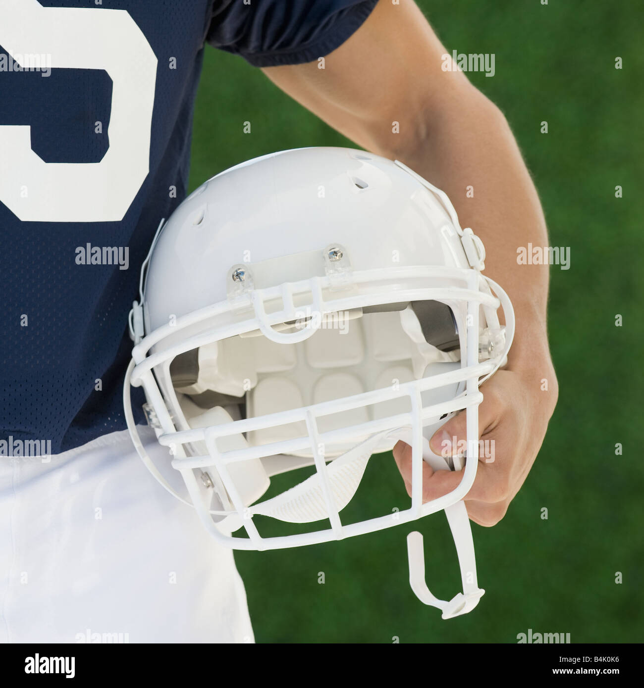 Midsection football holding helmet hi-res stock photography and images ...