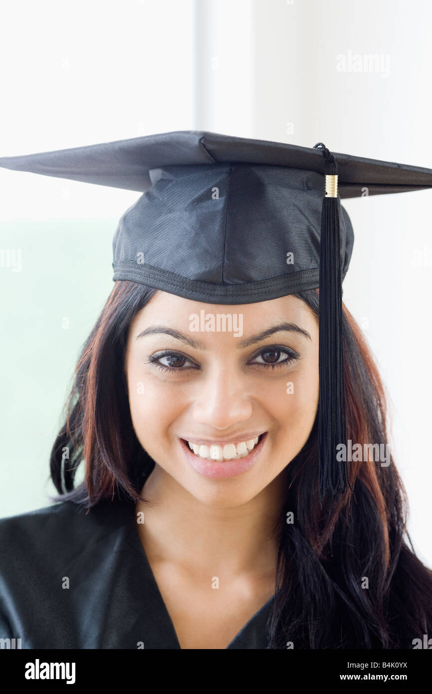 Mixed Race woman wearing graduation cap Stock Photo - Alamy