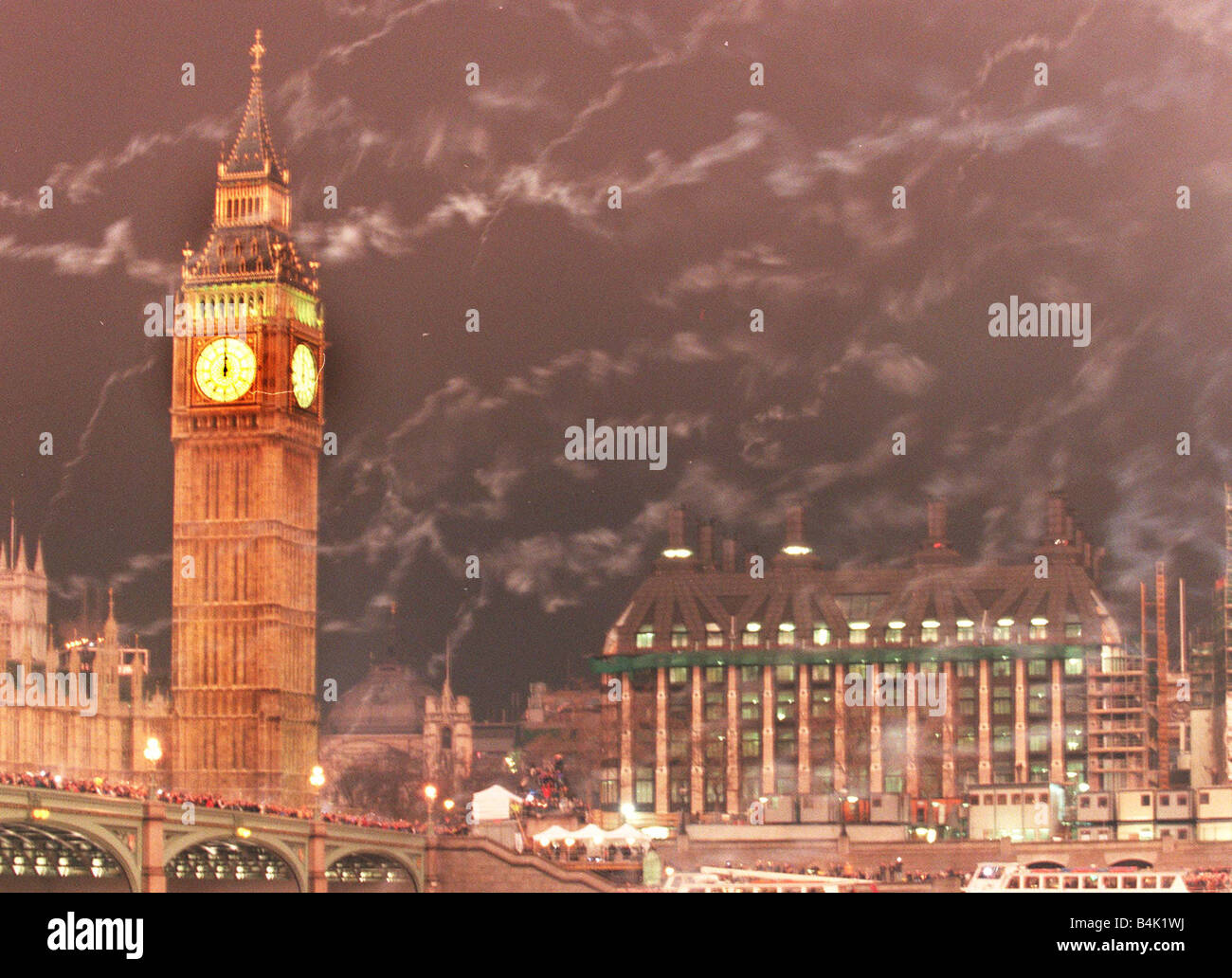 Fireworks explode over Big Ben January 2000 at the stroke of midnight ...