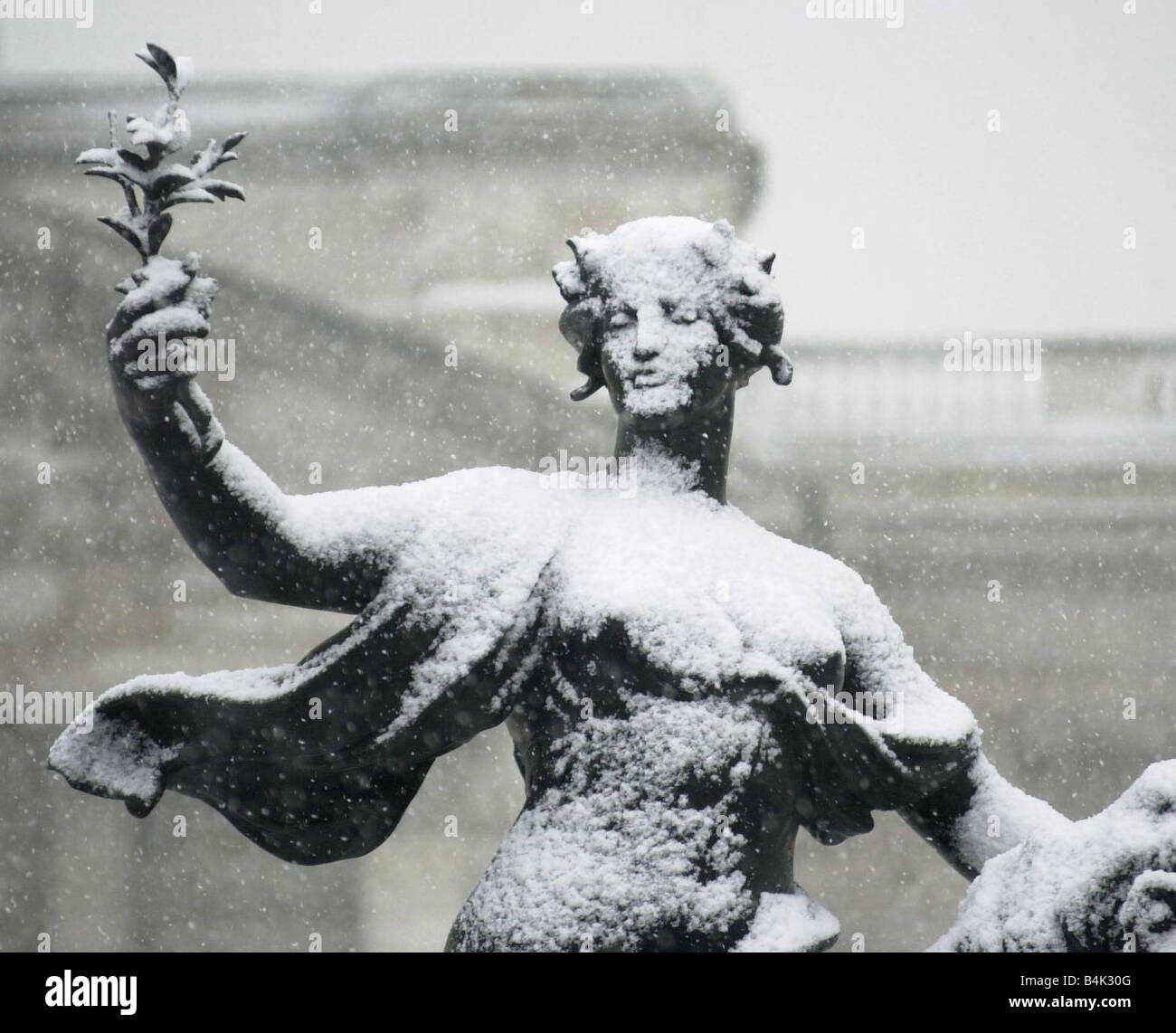 Snow falls in London after along time January 2003 snow covered statue ...